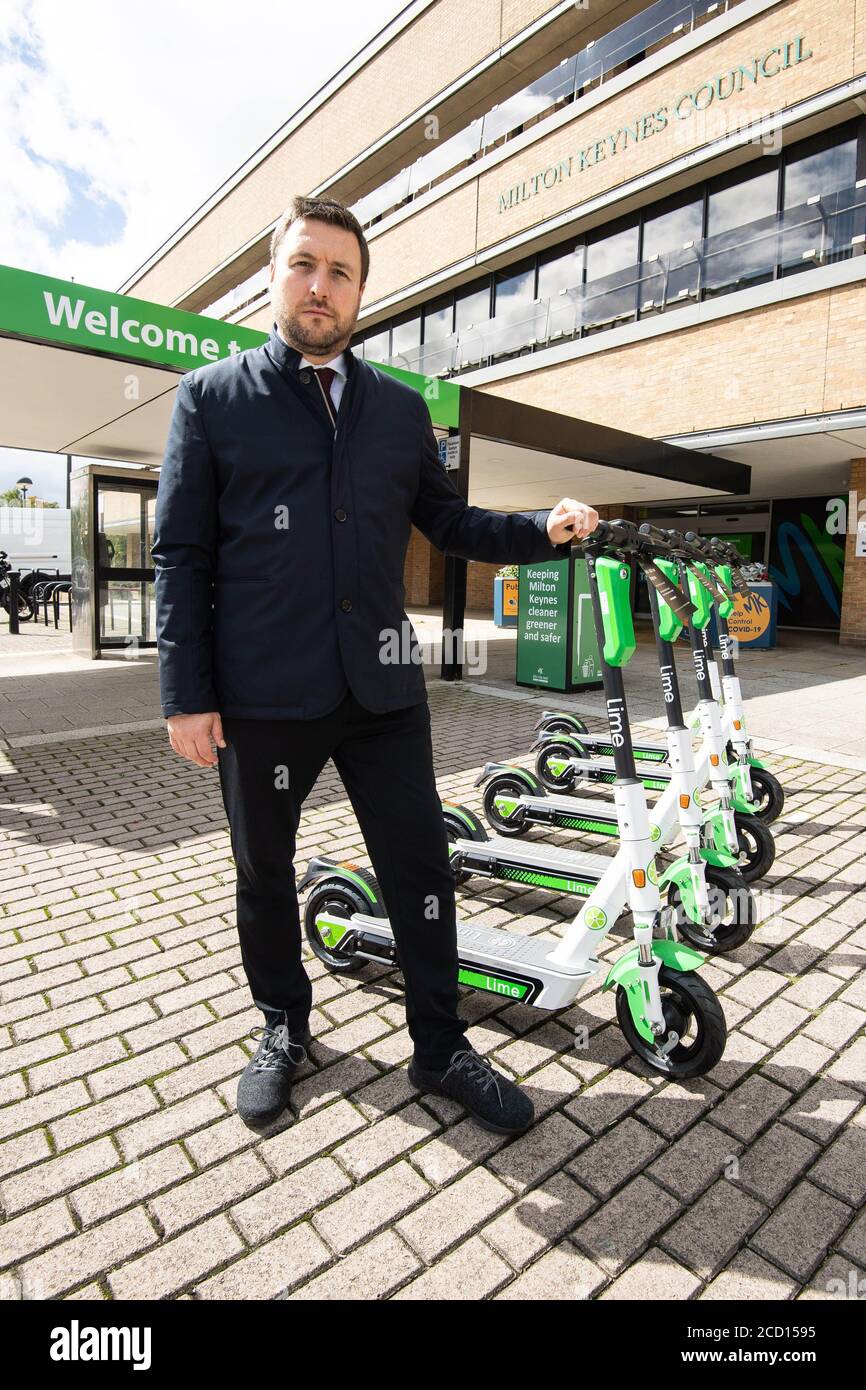 EDITORIAL USE ONLY Cllr Pete Marland, leader of Milton Keynes Council with e-scooters as Lime ...