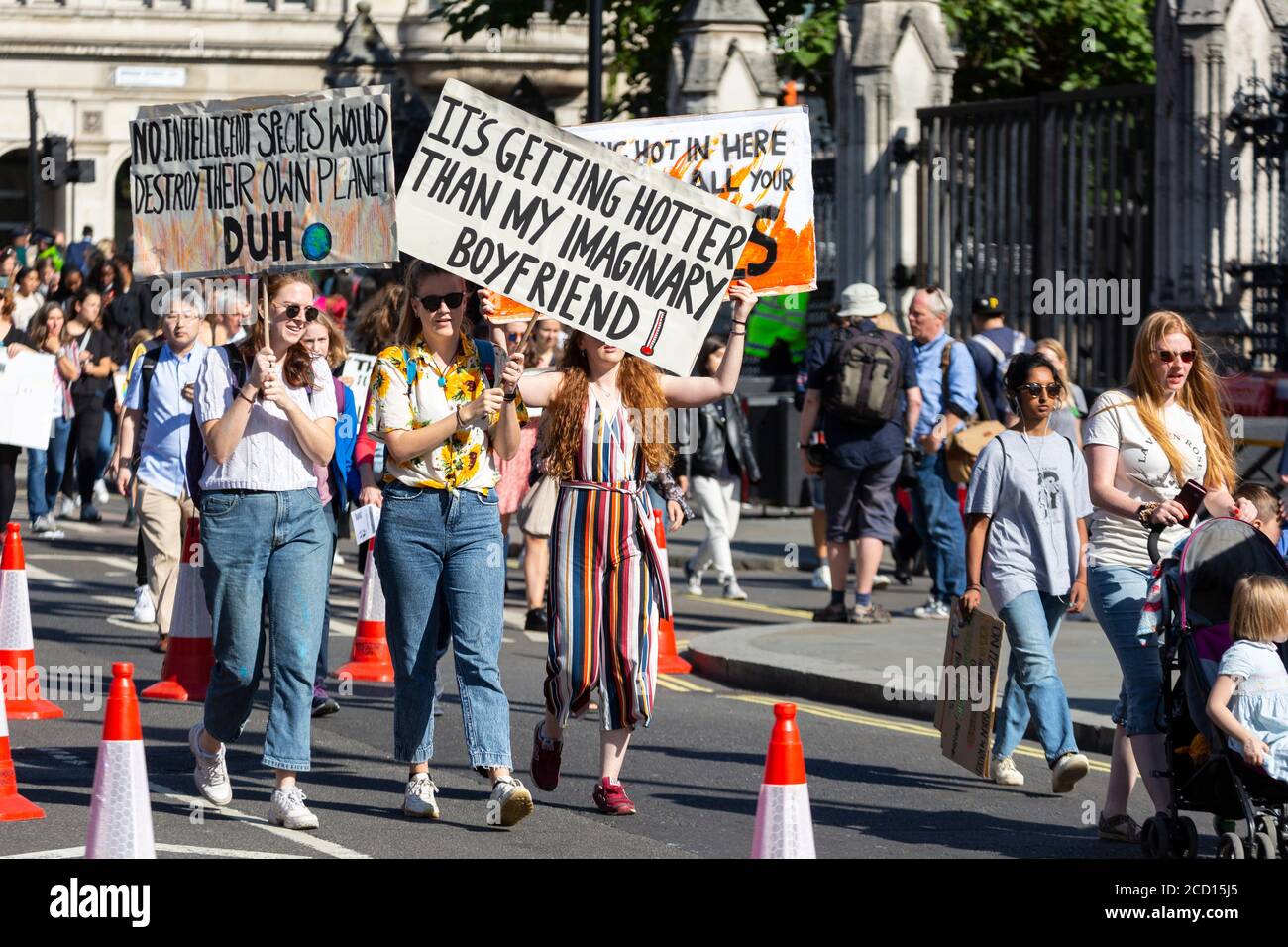 Protesters with signs during the Climate Strike, Parliament Square ...