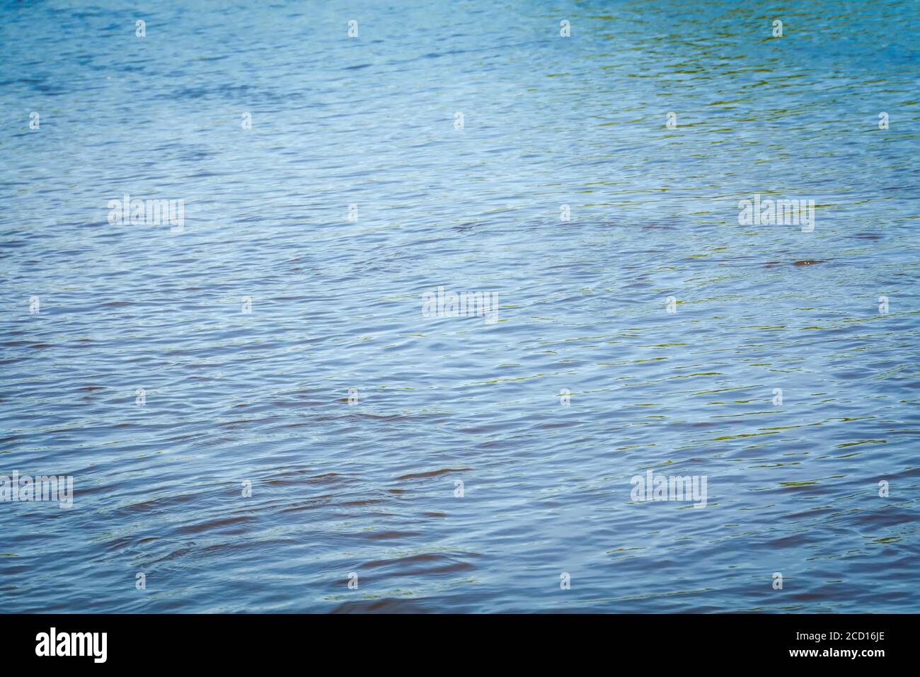 Wavy water surface of the small river, close up photo Stock Photo - Alamy