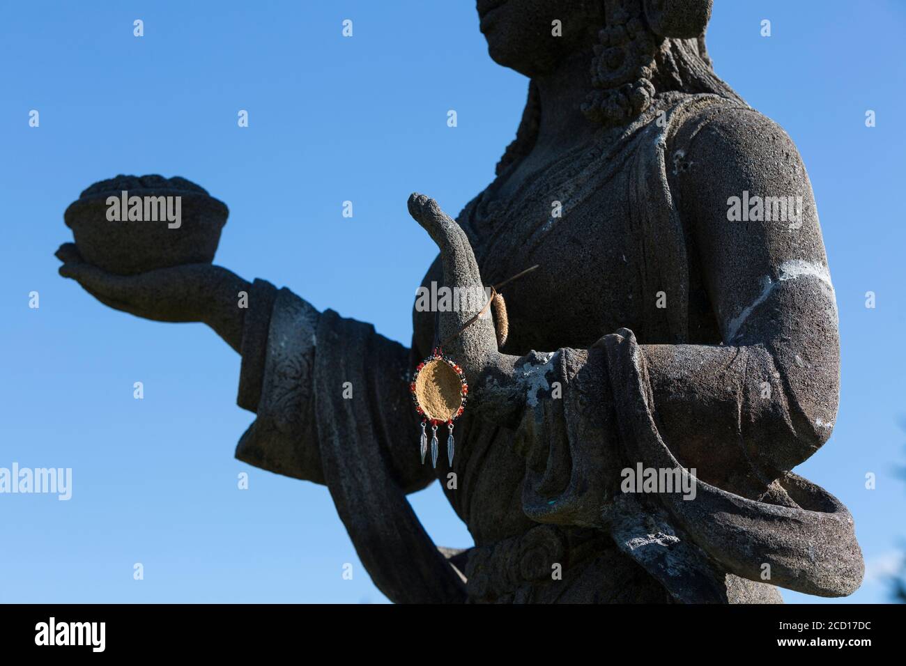 Offerings are left at the statue of Yeshe Tsogyal in the Garden of One ...