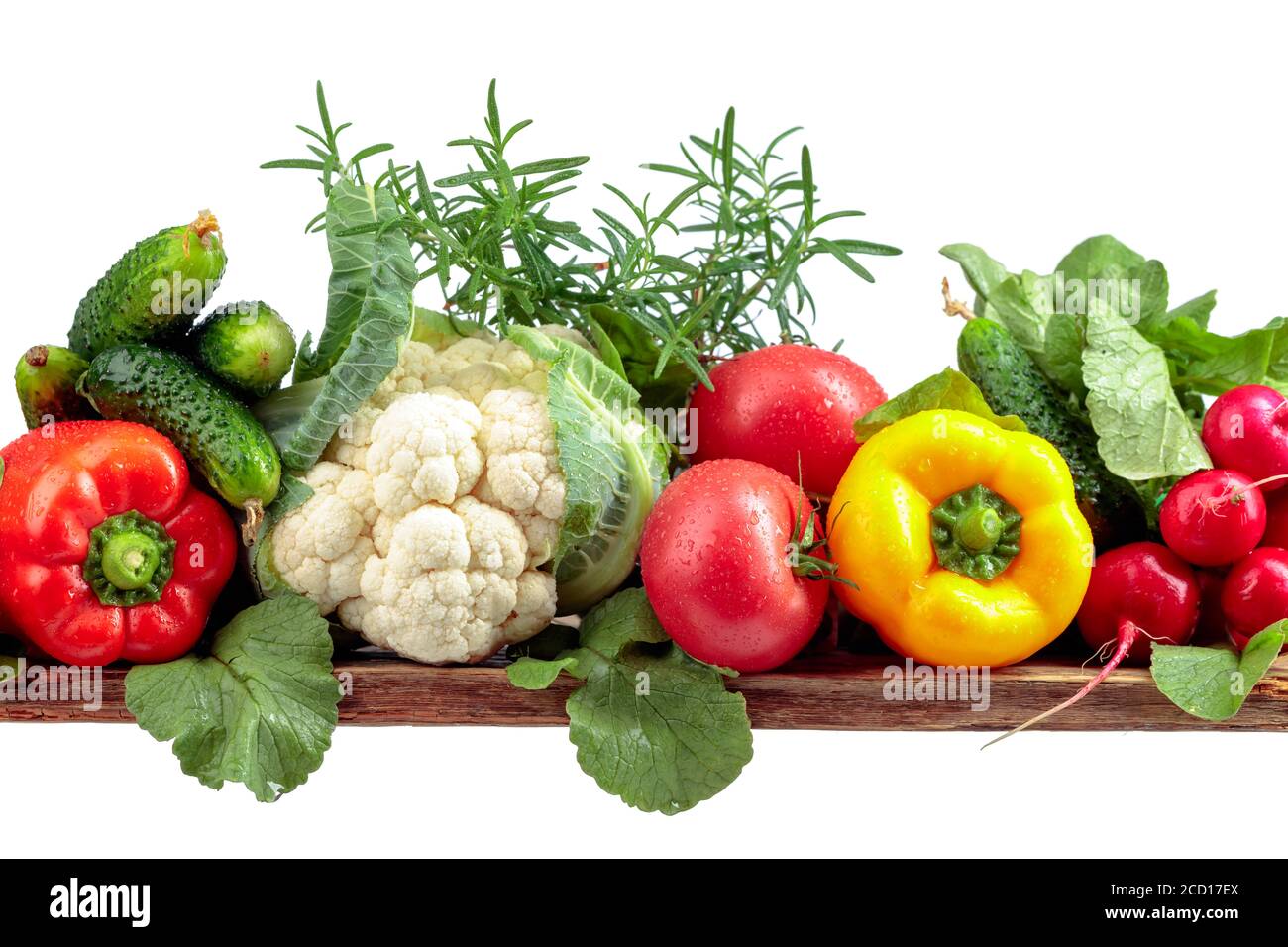 Various fresh raw vegetables, frontal view, isolated on white ...