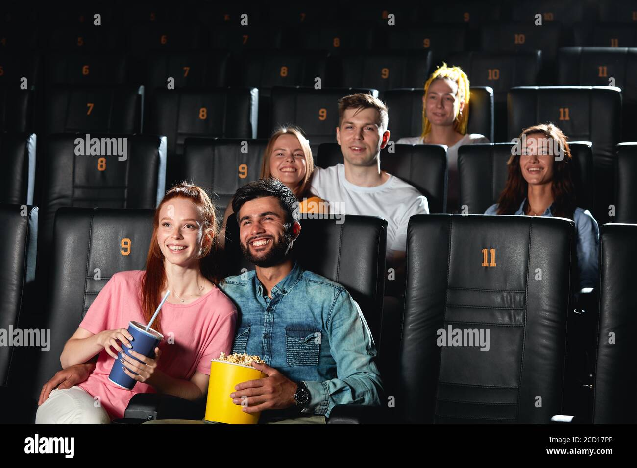 romantic couple gets pleasure from soap opera at the cinema Stock Photo ...