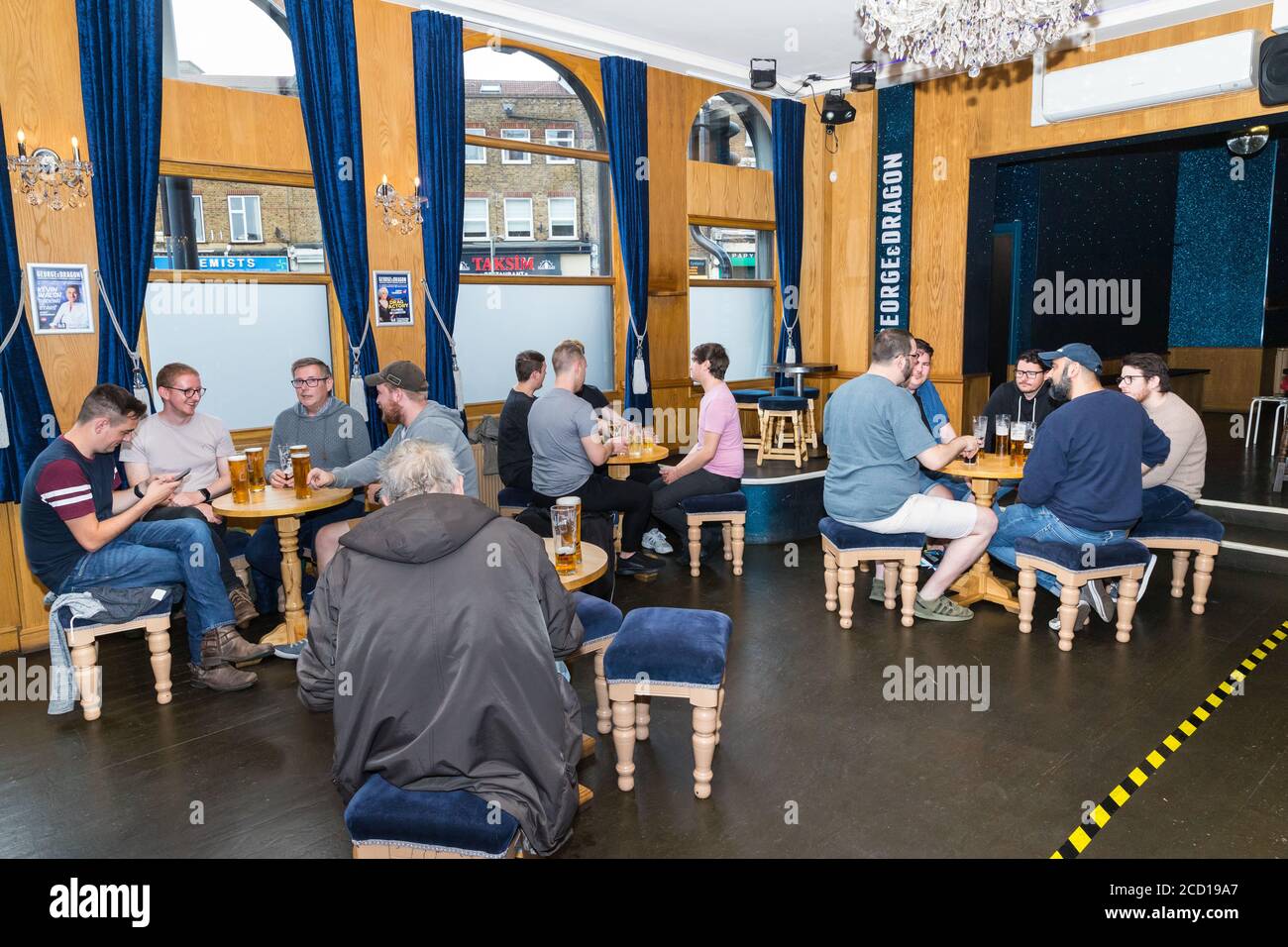 Interior image of a socially distanced bar Stock Photo - Alamy