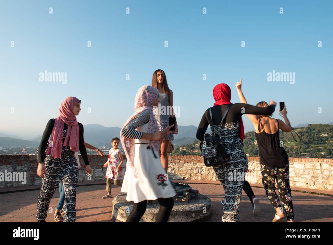 Egyptian girls running around the beautiful girl. Round dance. Ritual ...