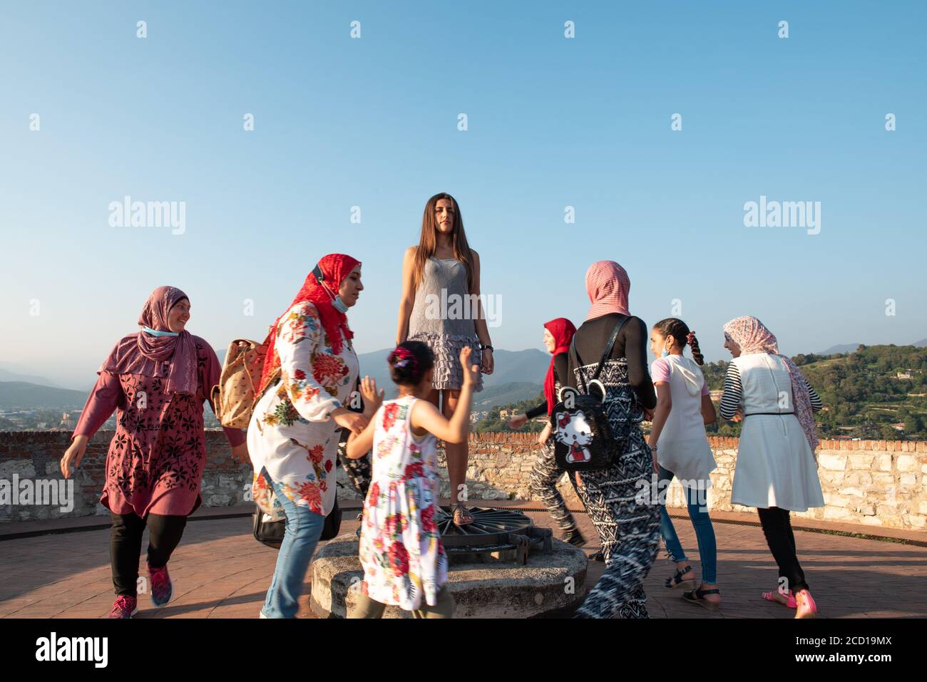 Egyptian girls running around the beautiful girl. Round dance. Ritual ...