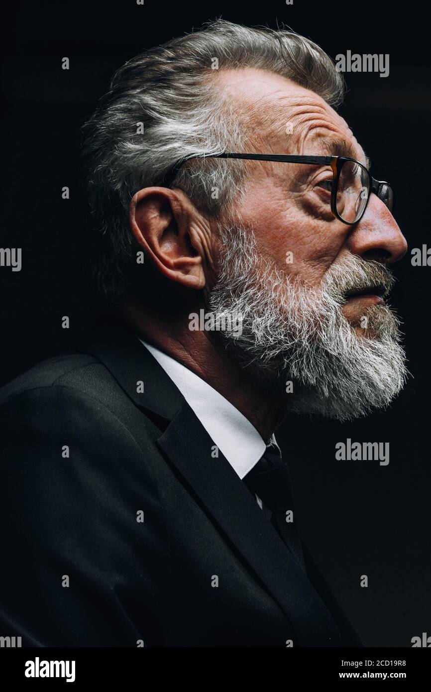 Posing spectacles suit tie hi-res stock photography and images - Alamy
