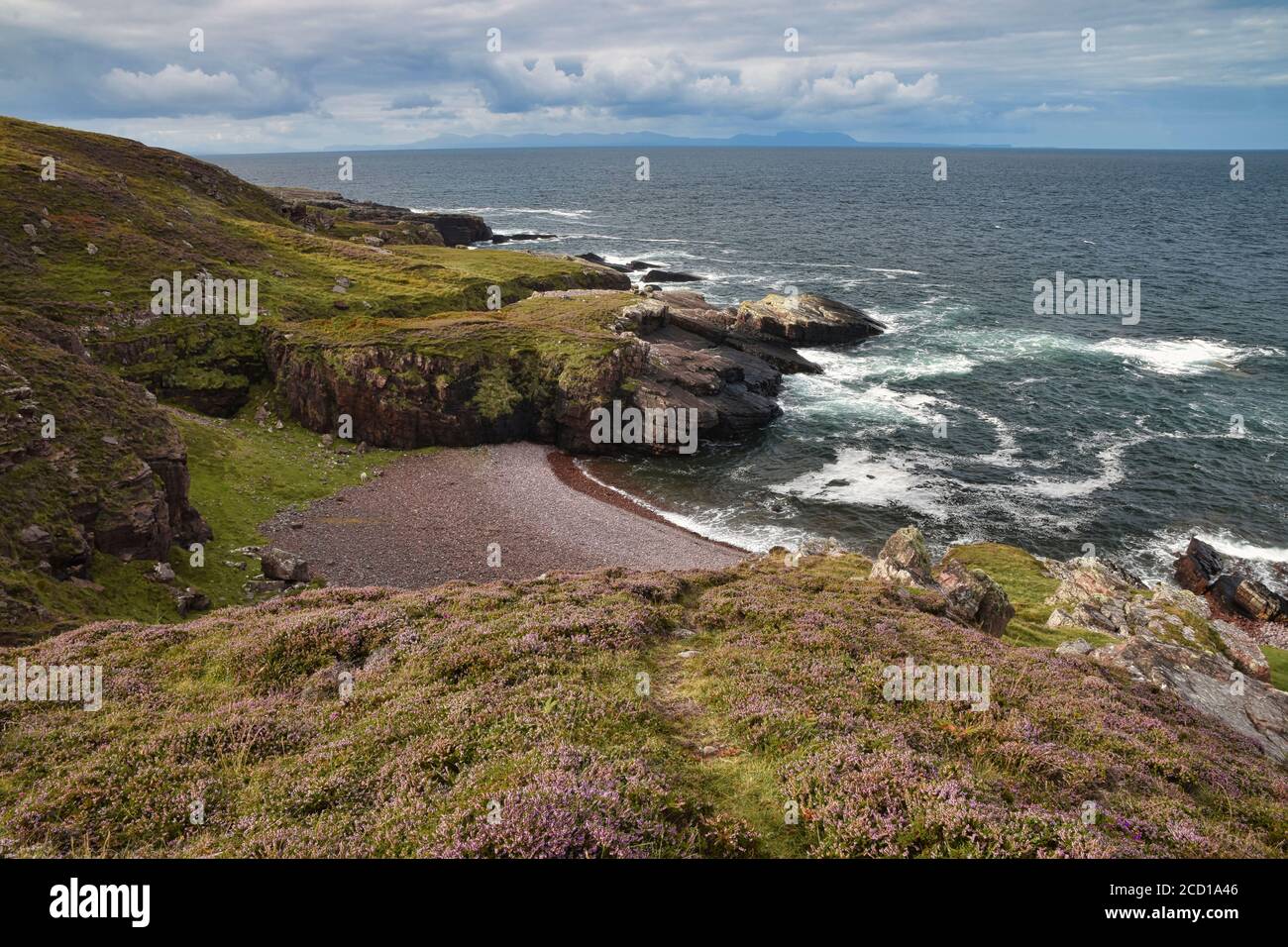 Pink shingle beach in Scottish Highlands near Gairloch with cliffs, sea ...