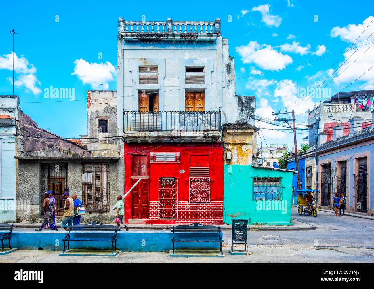 Havana, Cuba, July 2019, Construction Workers walking by some colourful ...
