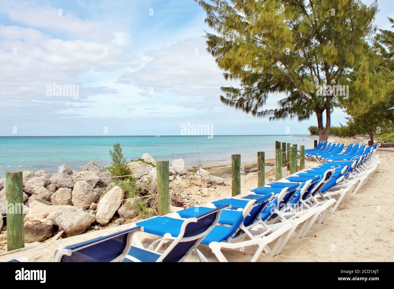 Lounge chairs on the beach Stock Photo - Alamy