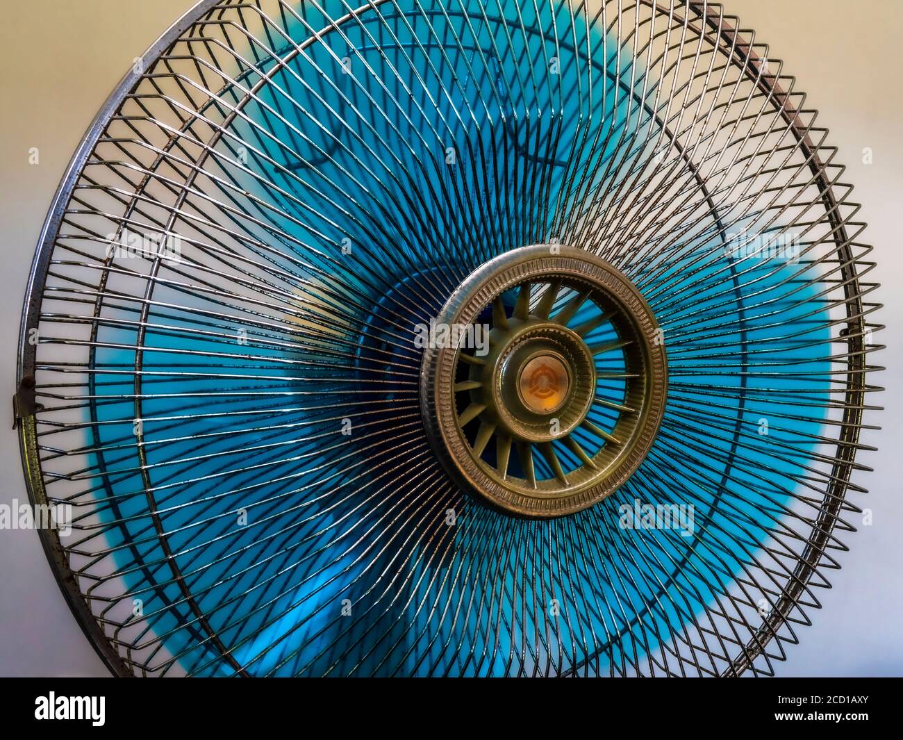 Old and slightly rusty vintage 1980s room fan, with distinctive turning ...
