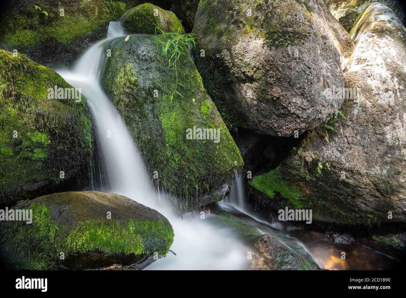 Long exposure of a waterfall at Becky Falls in Dartmoor National Park ...