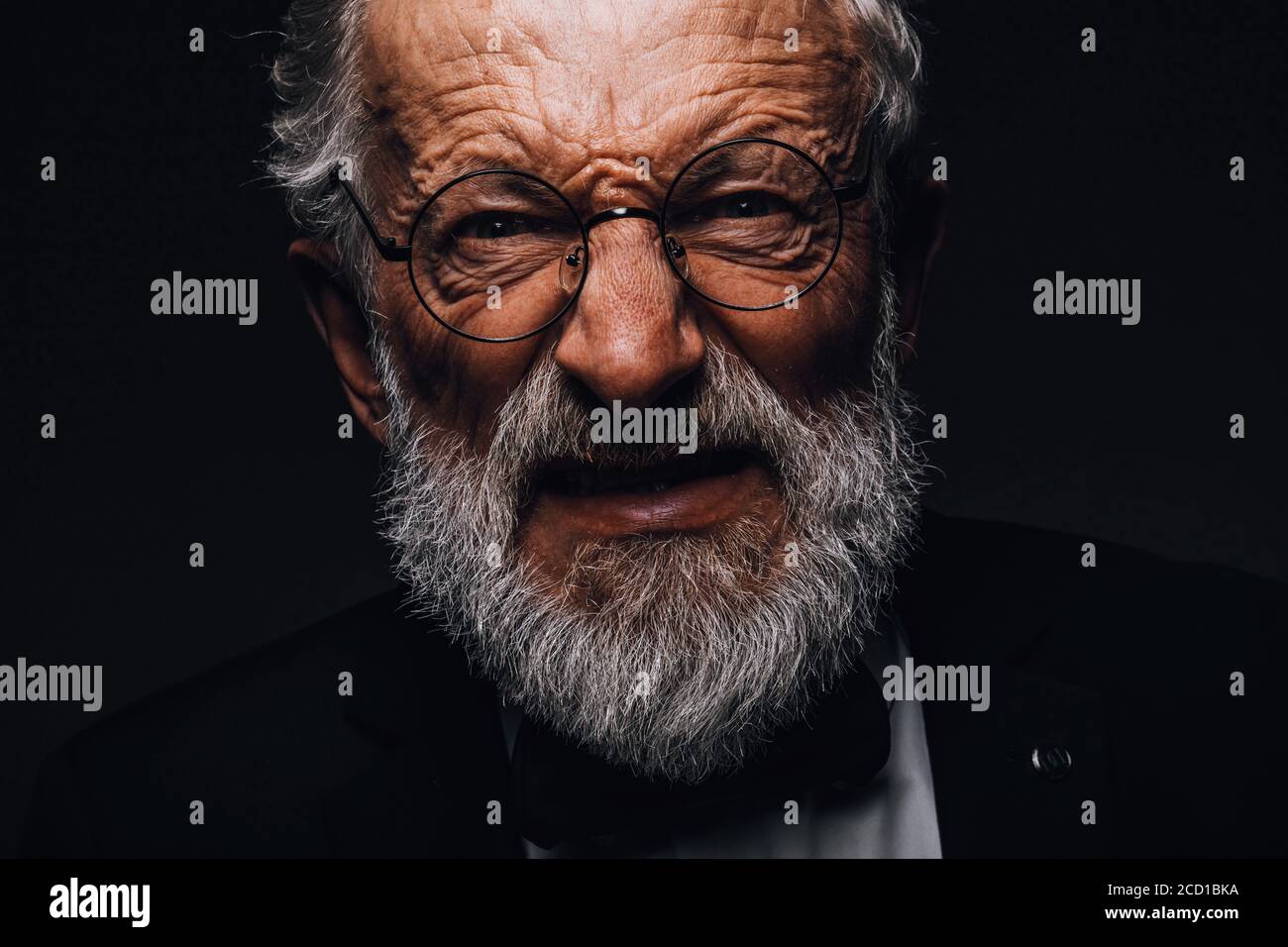 Close up portrait of old man with angry evil horror expression on face ...