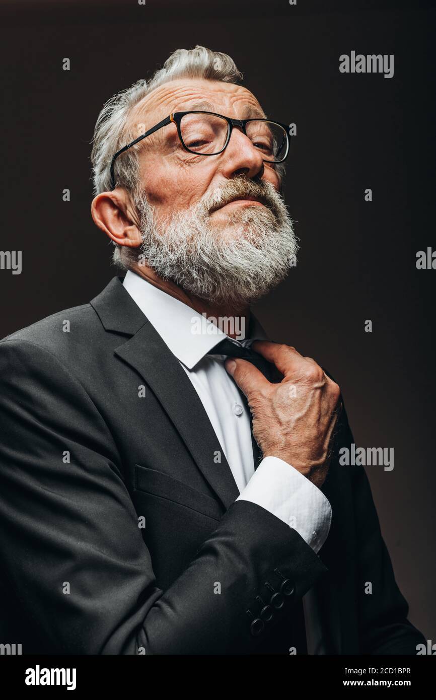 Senior man wearing formal hi-res stock photography and images - Alamy