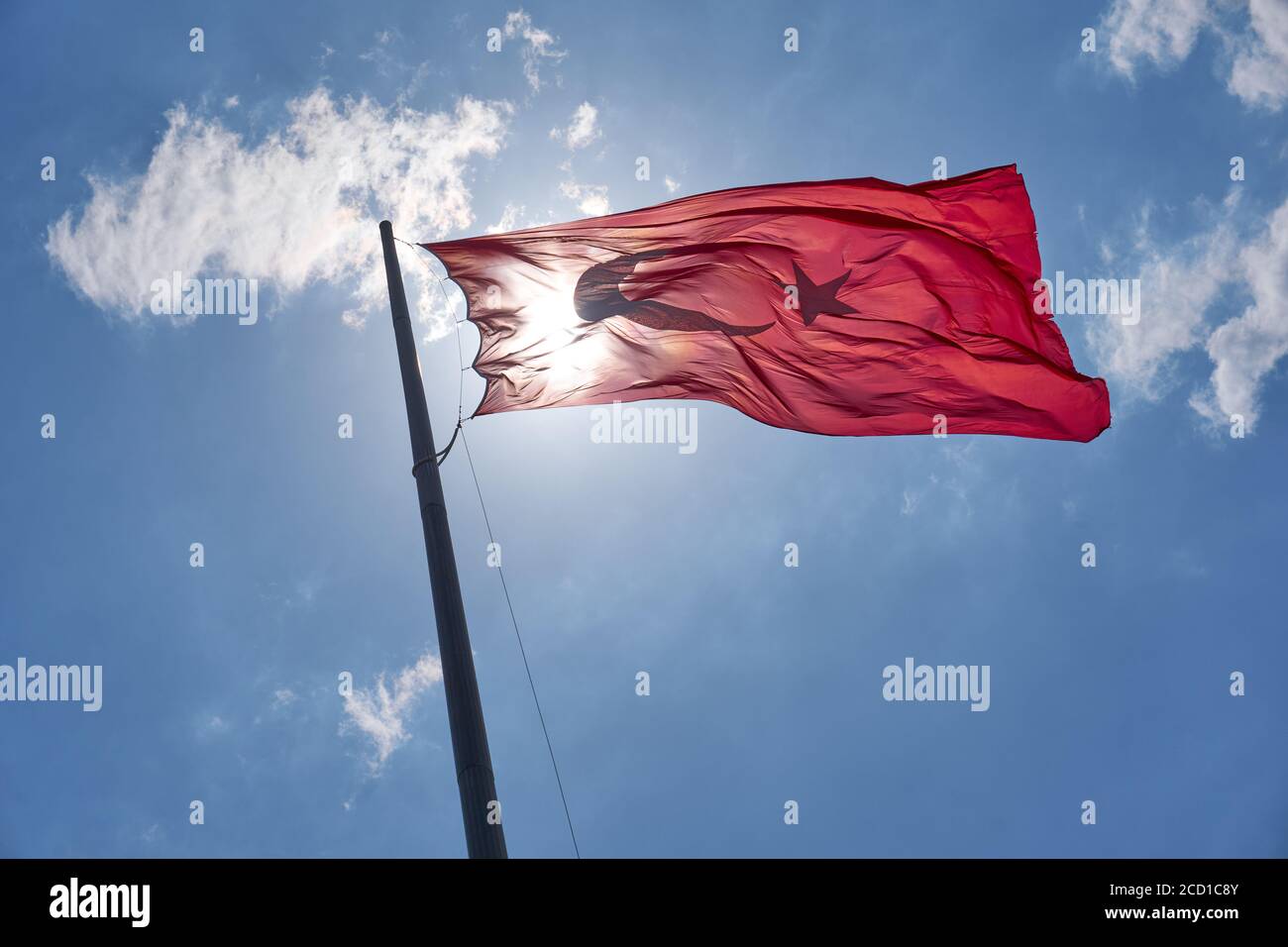 The red turkish flag with star and crescent flying hi-res stock ...