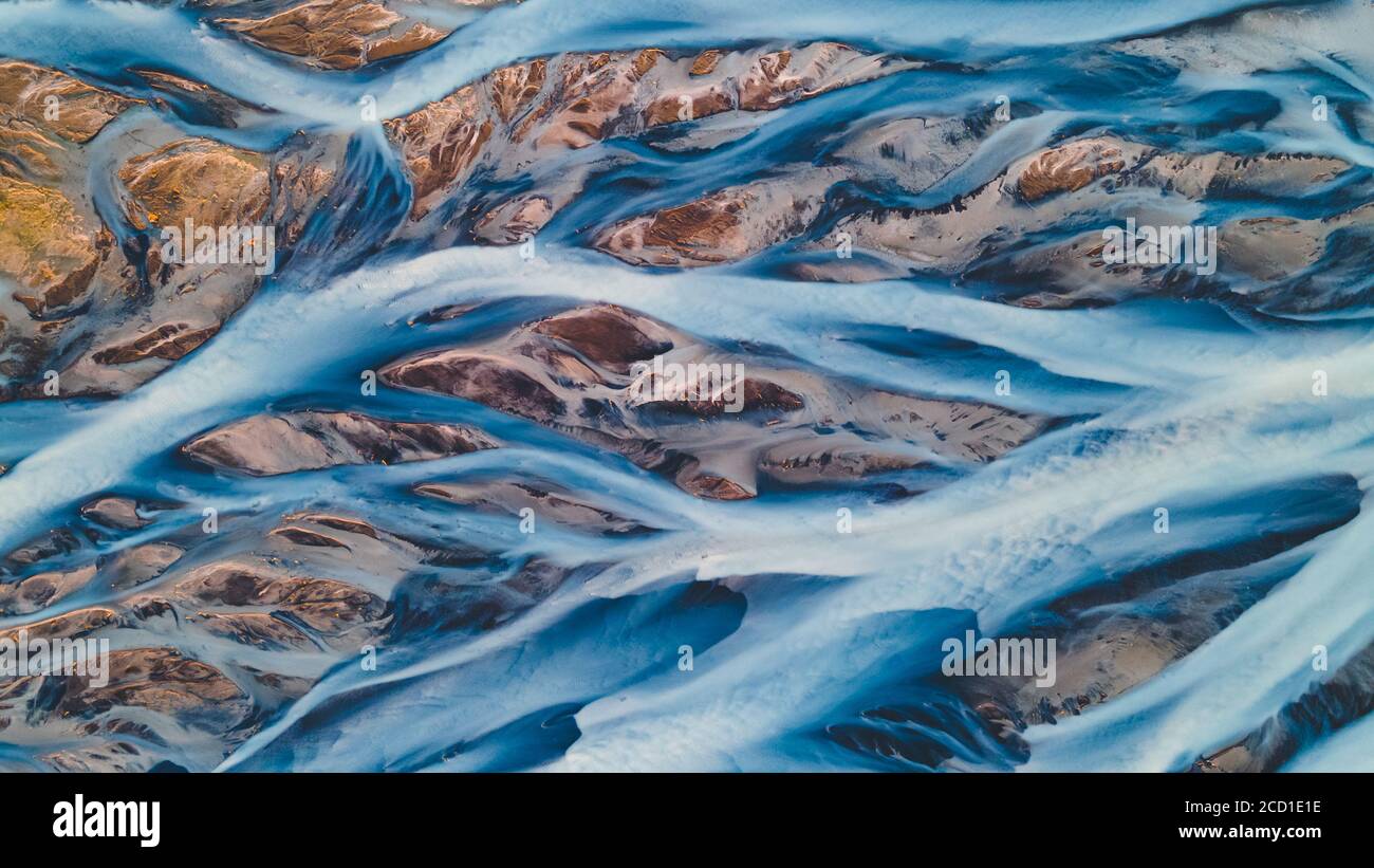 A glacial rivers from above. Aerial photograph of the river streams ...