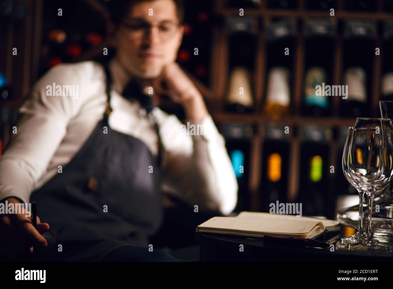 Sommelier presenting wine hi-res stock photography and images - Alamy