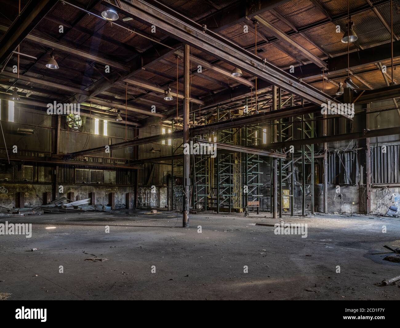 Interior of old abandoned factory warehouse Stock Photo - Alamy