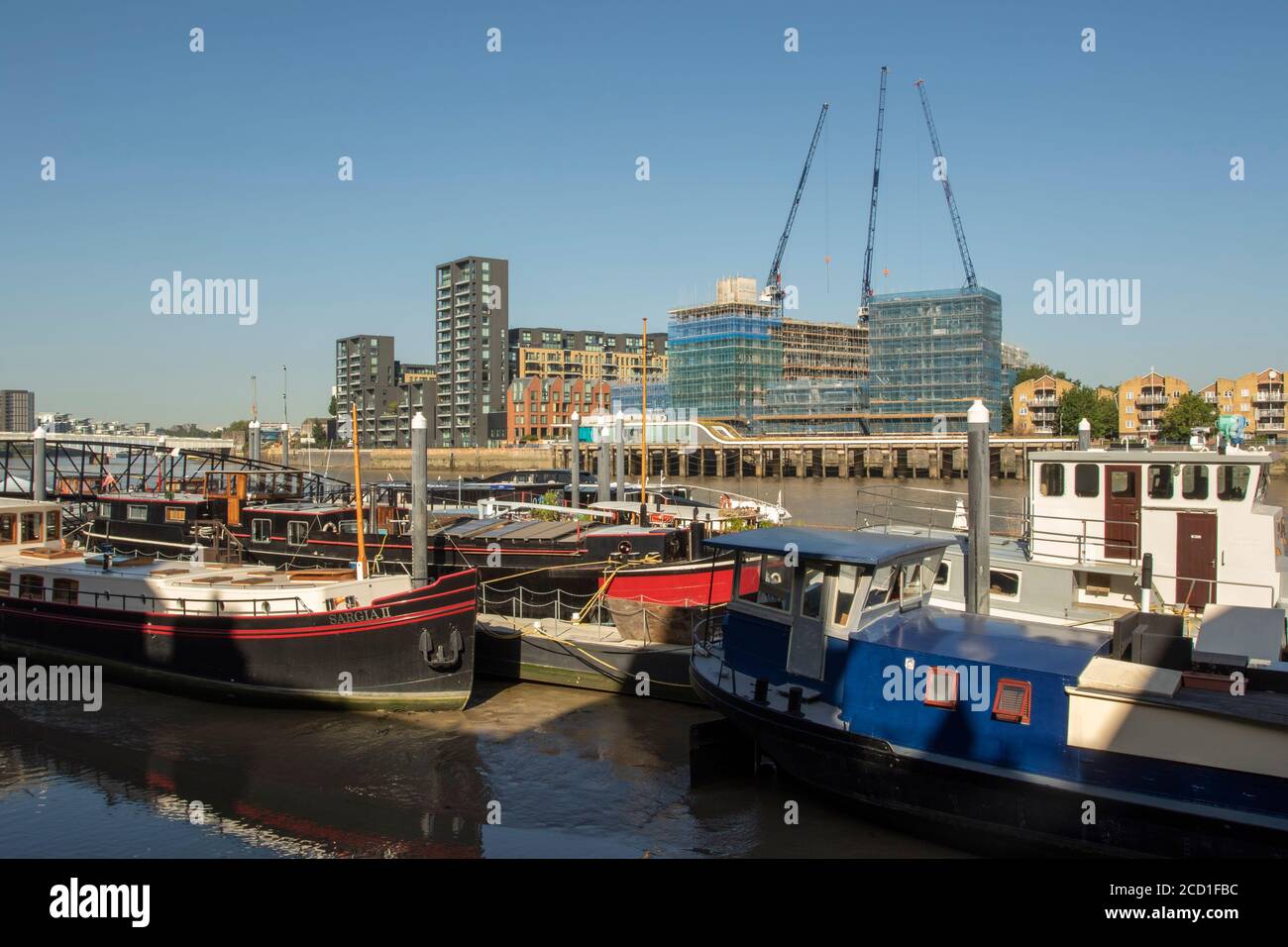 Thames riverside architecture from the river walk, Battersea, England ...