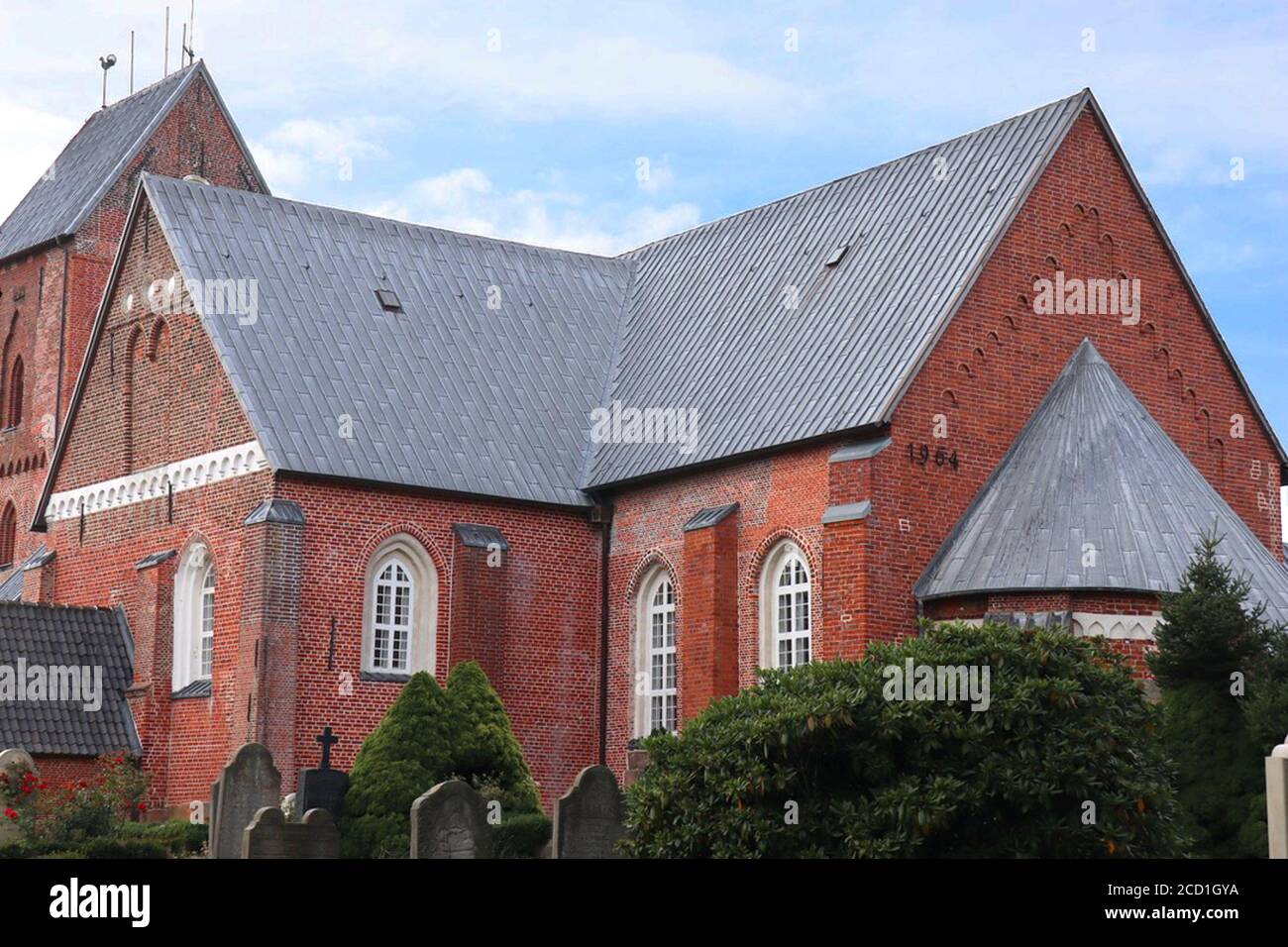 Old cobblestone church with a graveyard Stock Photo - Alamy