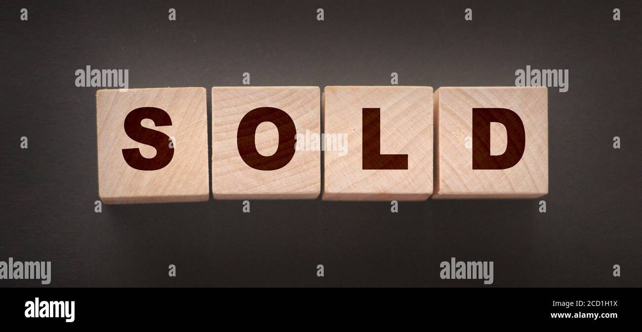 Sold Word Written In Wooden Cubes. Real estate business concept Stock ...