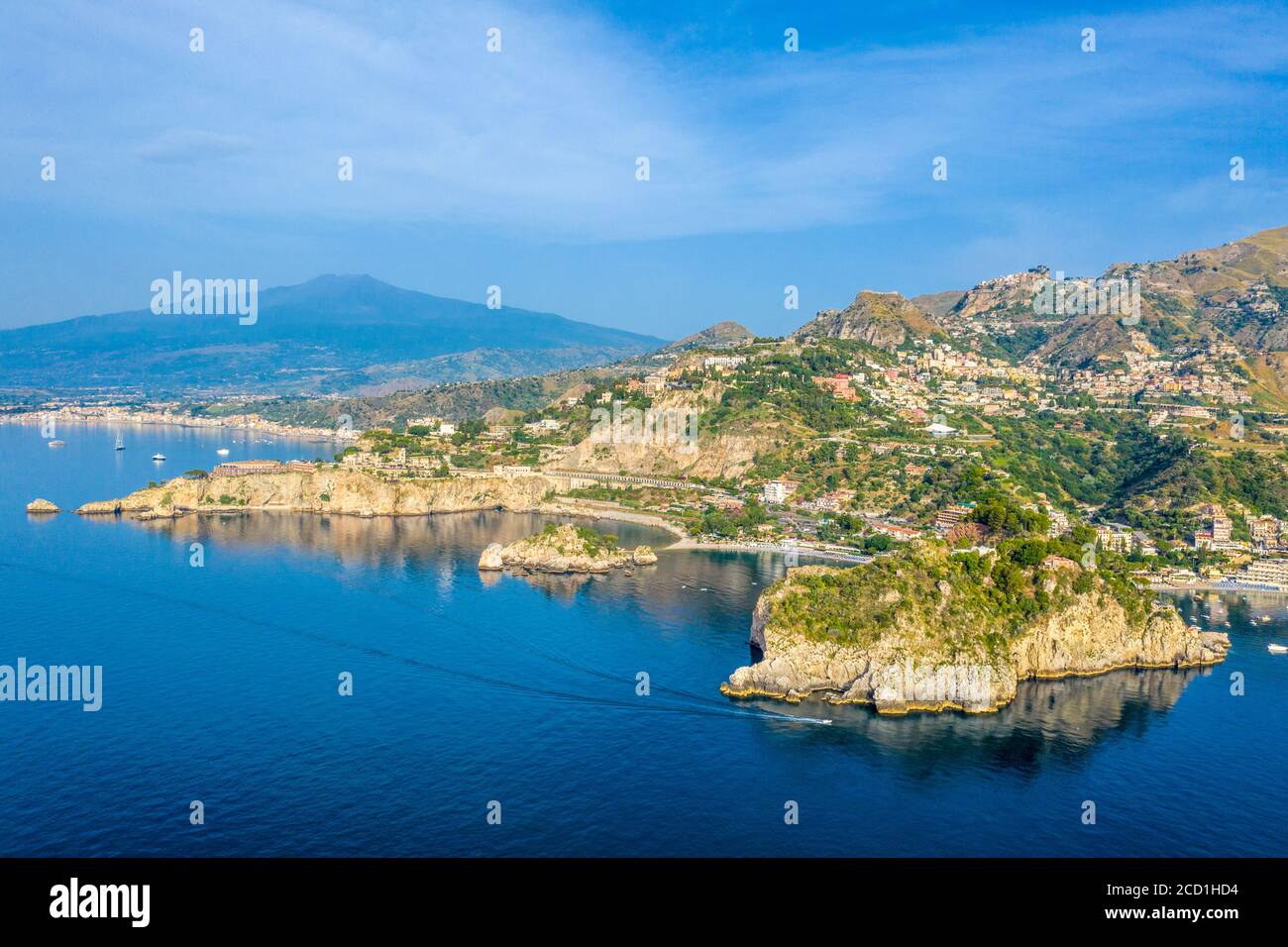 Aerial panoramic view of the town of Taormina, Isola Bella island ...