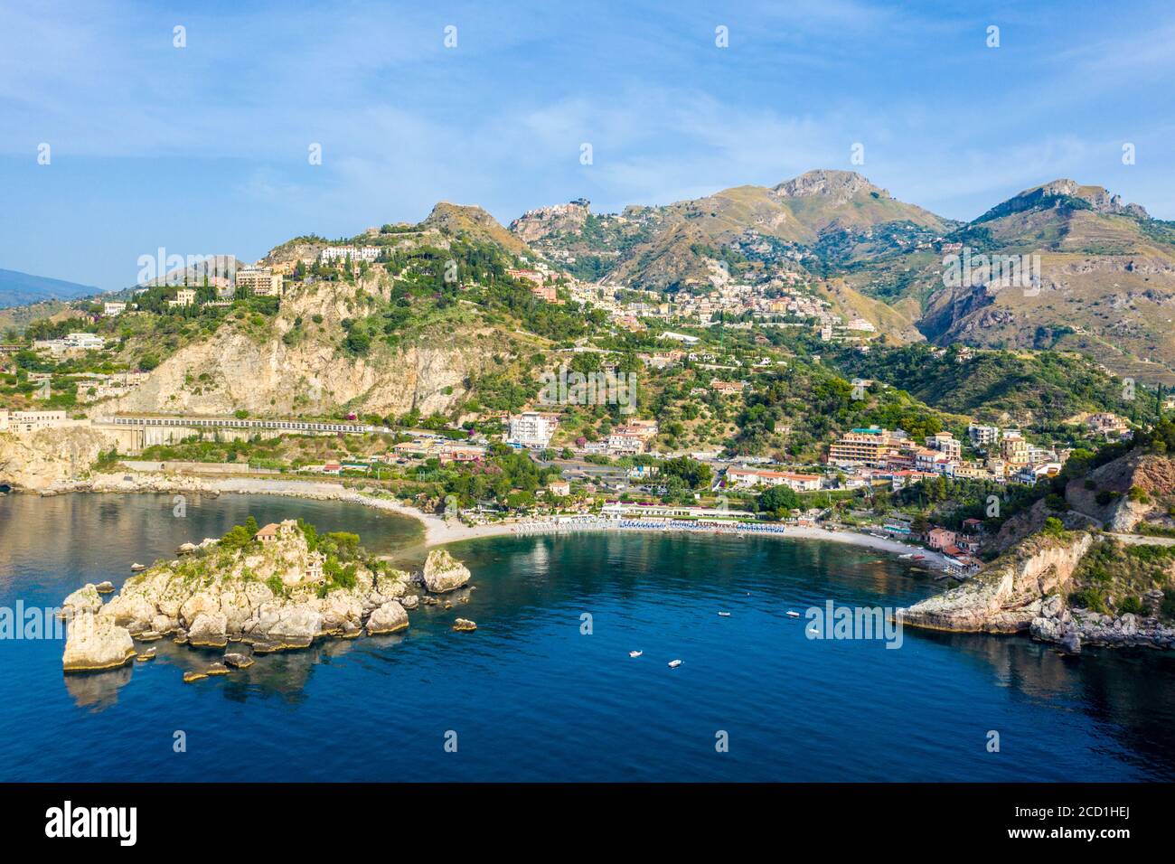 Aerial panoramic view of the town of Taormina and Isola Bella island ...