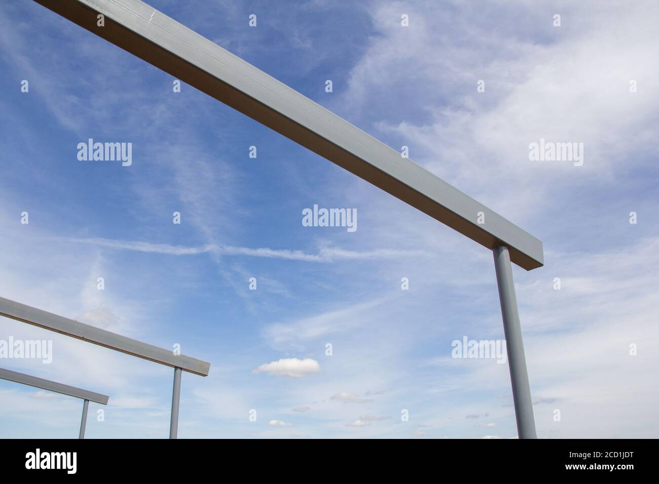 Steel beams on blue sky background. Industrial background Stock Photo ...