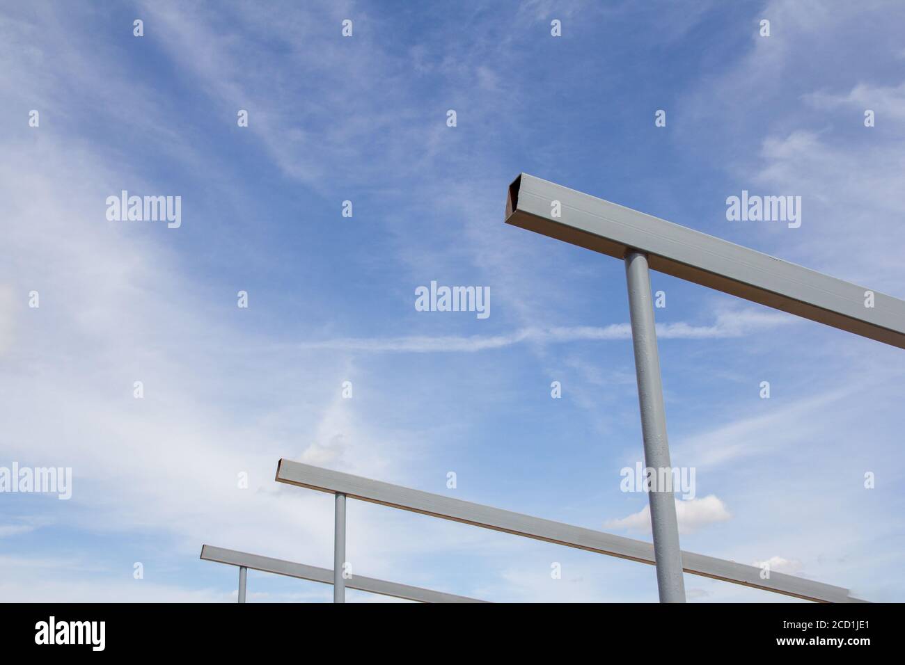 Steel beams on blue sky background. Industrial background Stock Photo ...