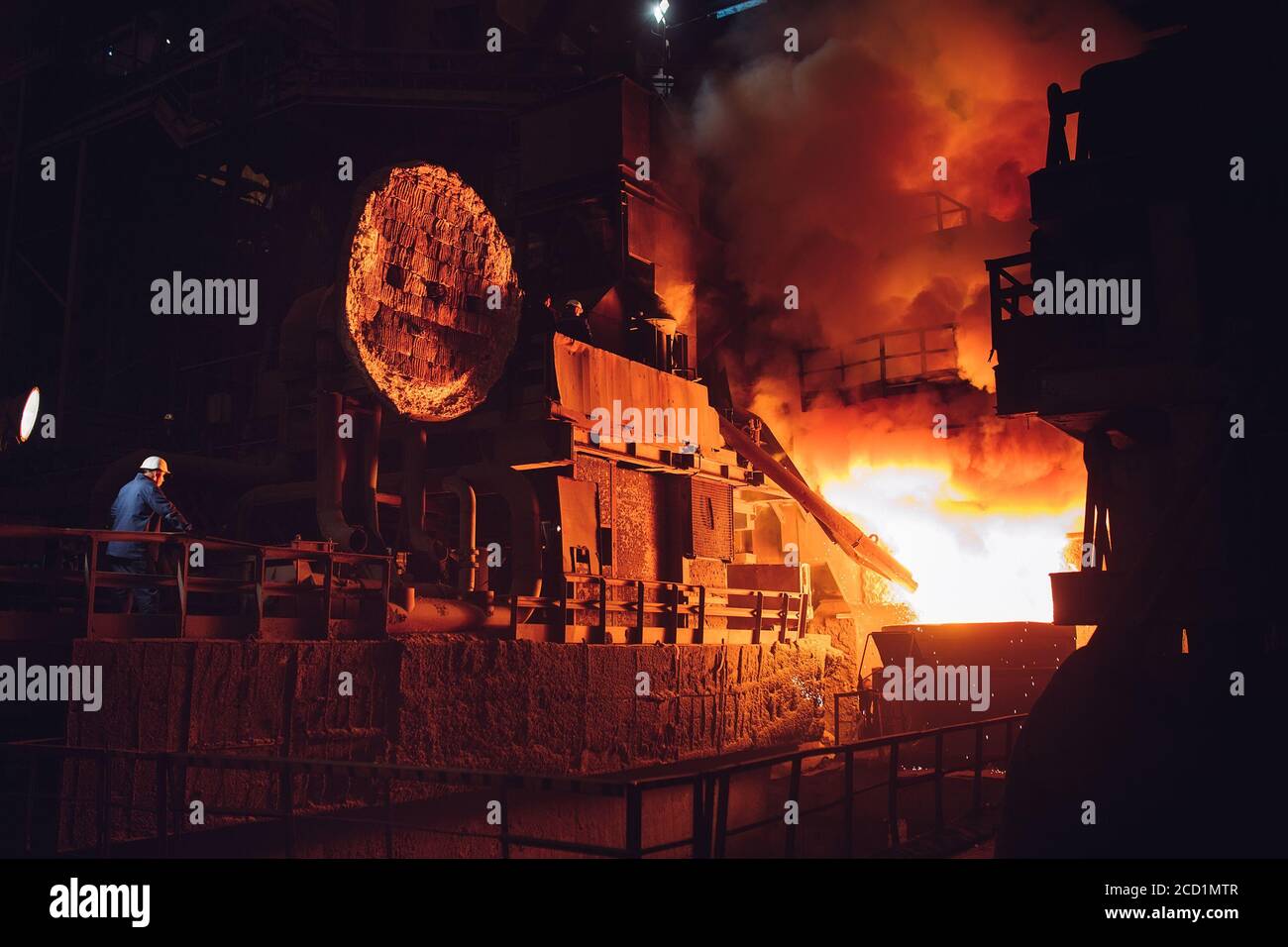 Melting of metal in a steel plant. High temperature in the melting ...