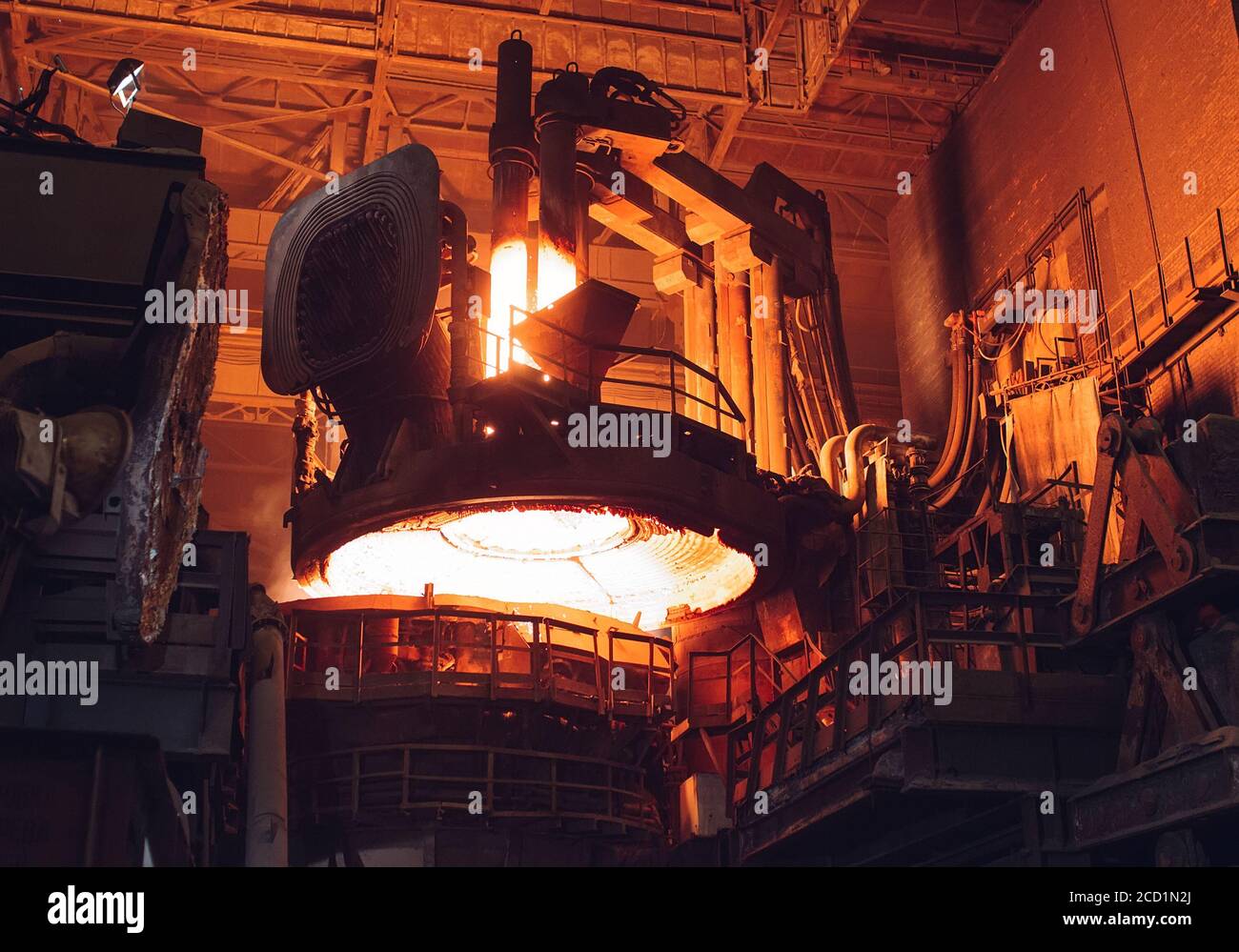 Melting of metal in a steel plant. High temperature in the melting ...