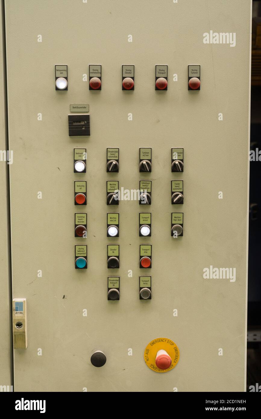 Close up of electric control panel with switches, multi colored ...