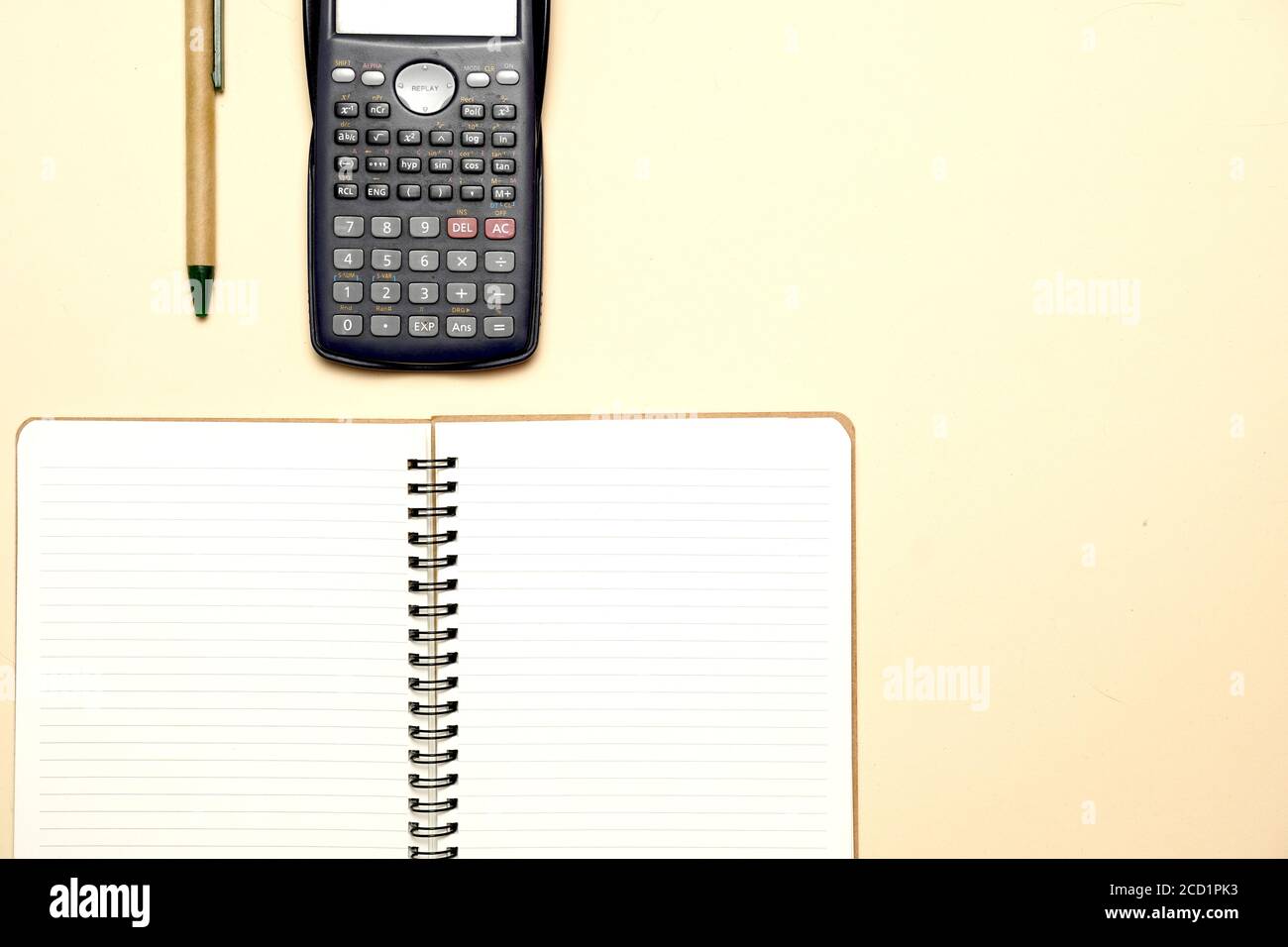 top view of workspace with calculator and pen with copy space. flat lay ...
