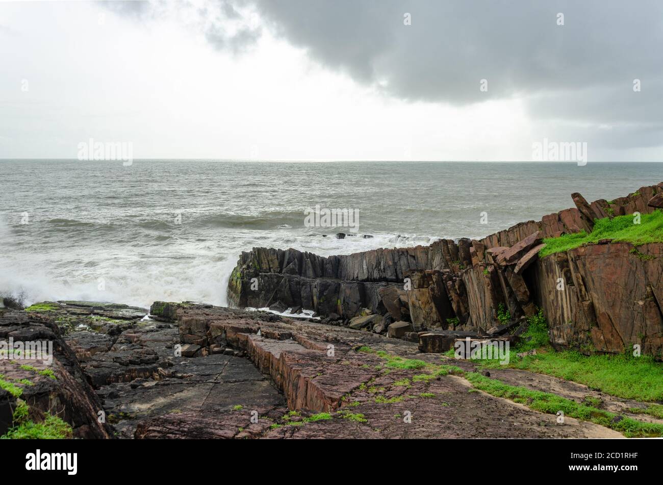 Monsoon Season view of the rough Arabian Sea and Rocky Shoreline near ...