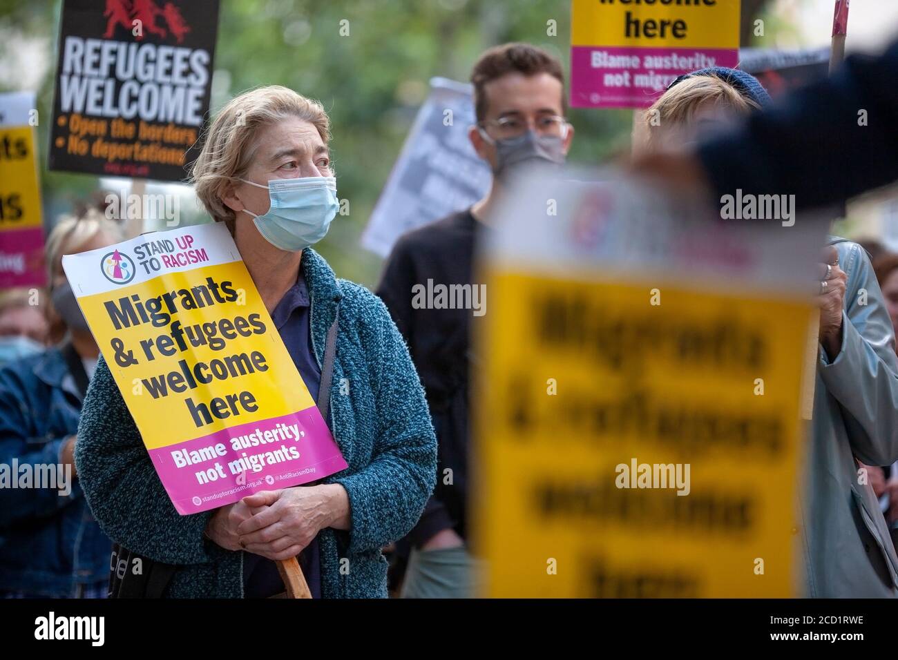 Protesters at a ‘Refugees Welcome Here’ protest outside the home office ...
