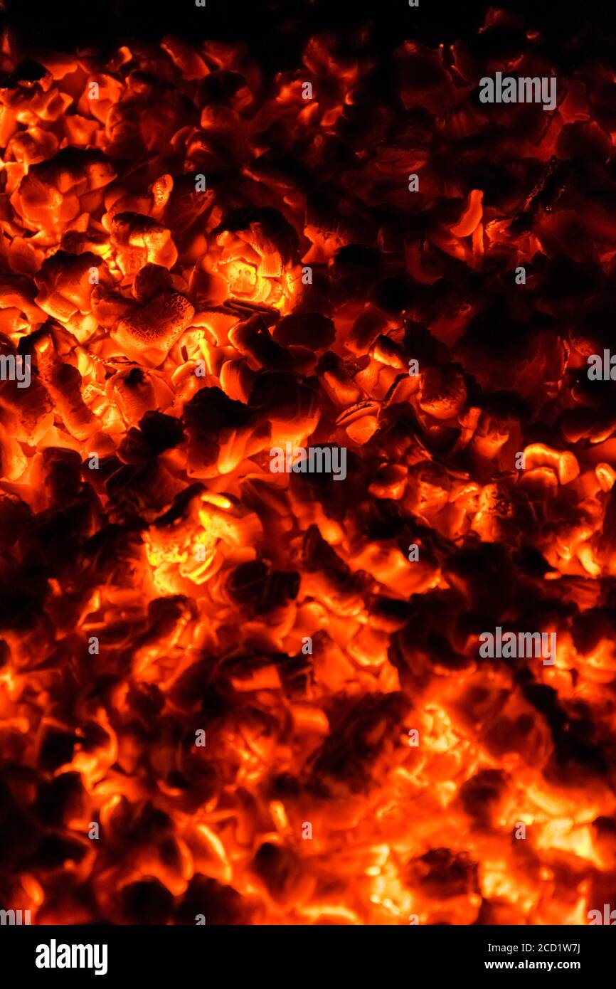 Hot and burning coals in a brazier at night Stock Photo - Alamy
