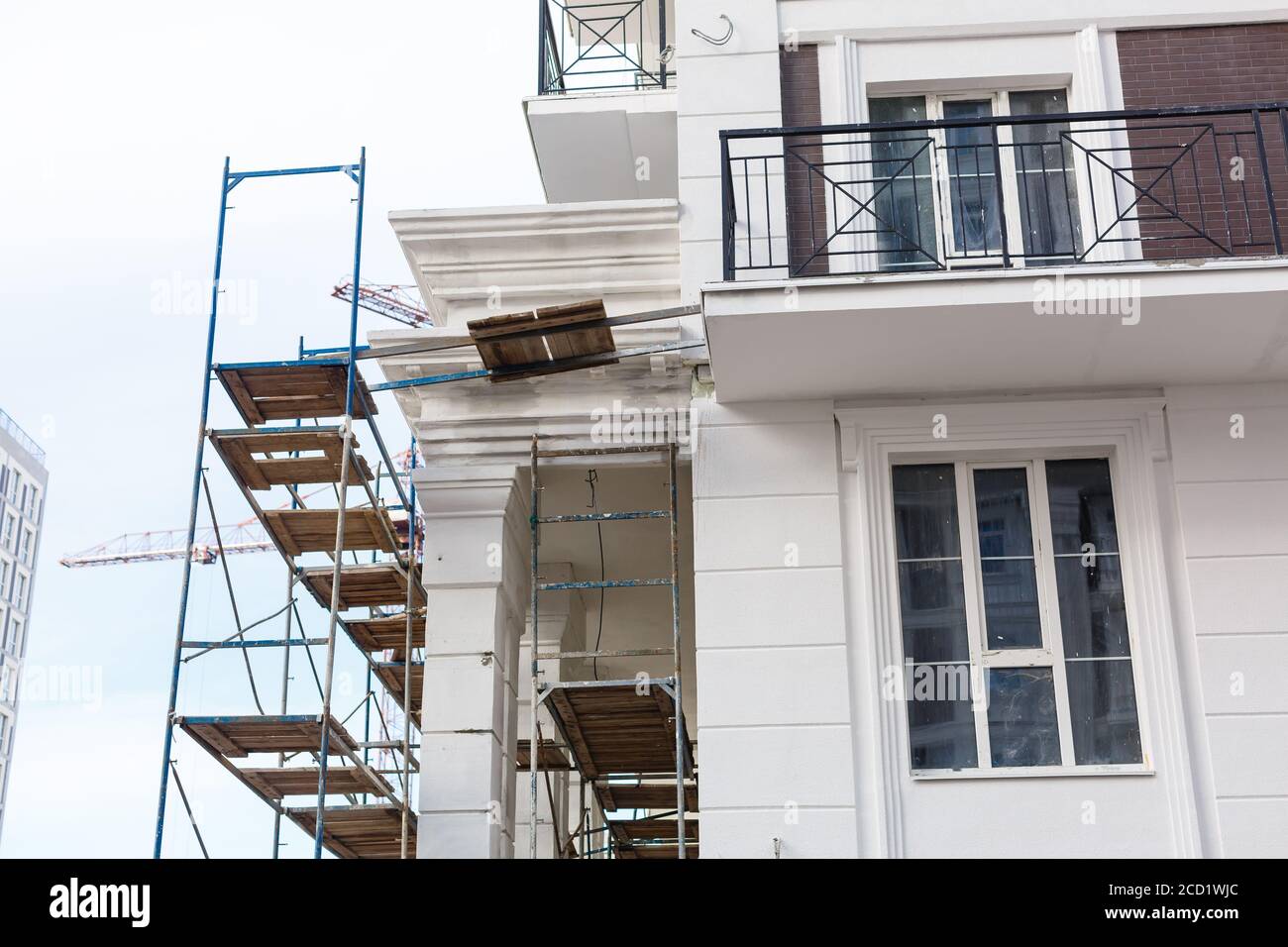Extensive scaffolding providing platforms for work in progress on a new ...