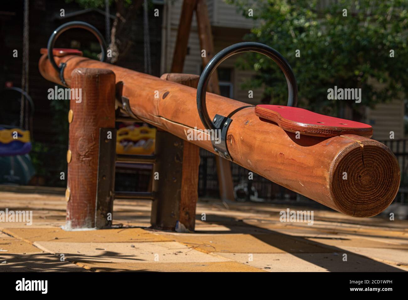 wooden seesaw for children in the park. close-up Stock Photo - Alamy
