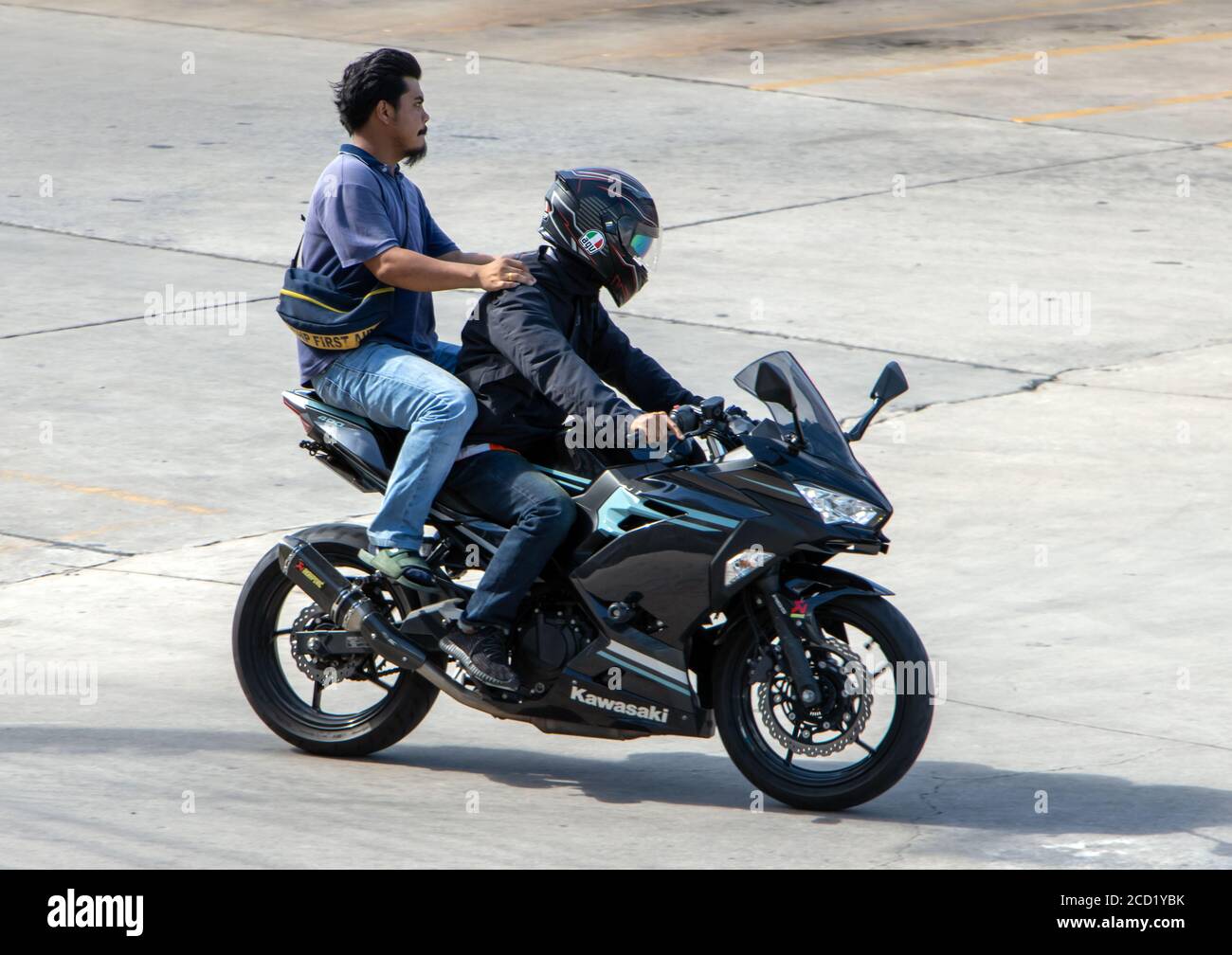 Two men ride on motorcycle hi-res stock photography and images - Alamy