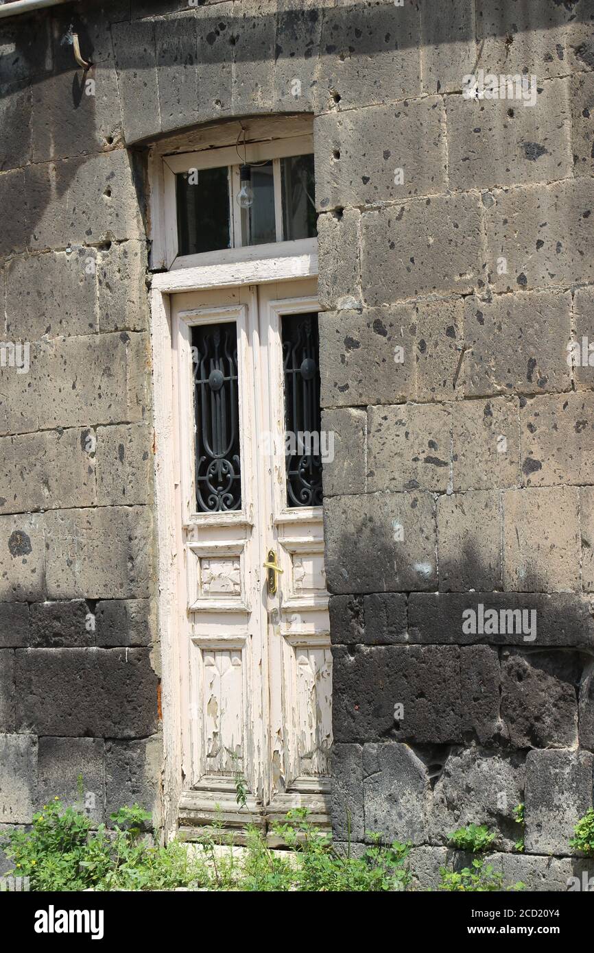 Vertical shot of an old white wooden door Stock Photo - Alamy