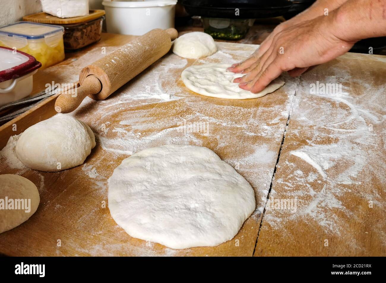 Close up shot of the process of making pizza dough Stock Photo - Alamy