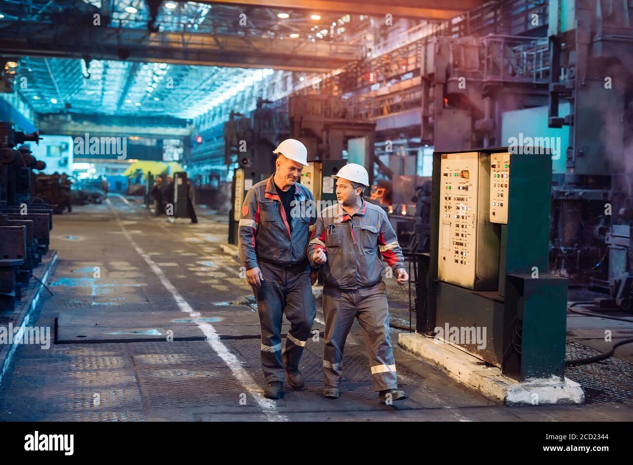 Workers in the steel mill. Metallurgical production or plant Stock ...