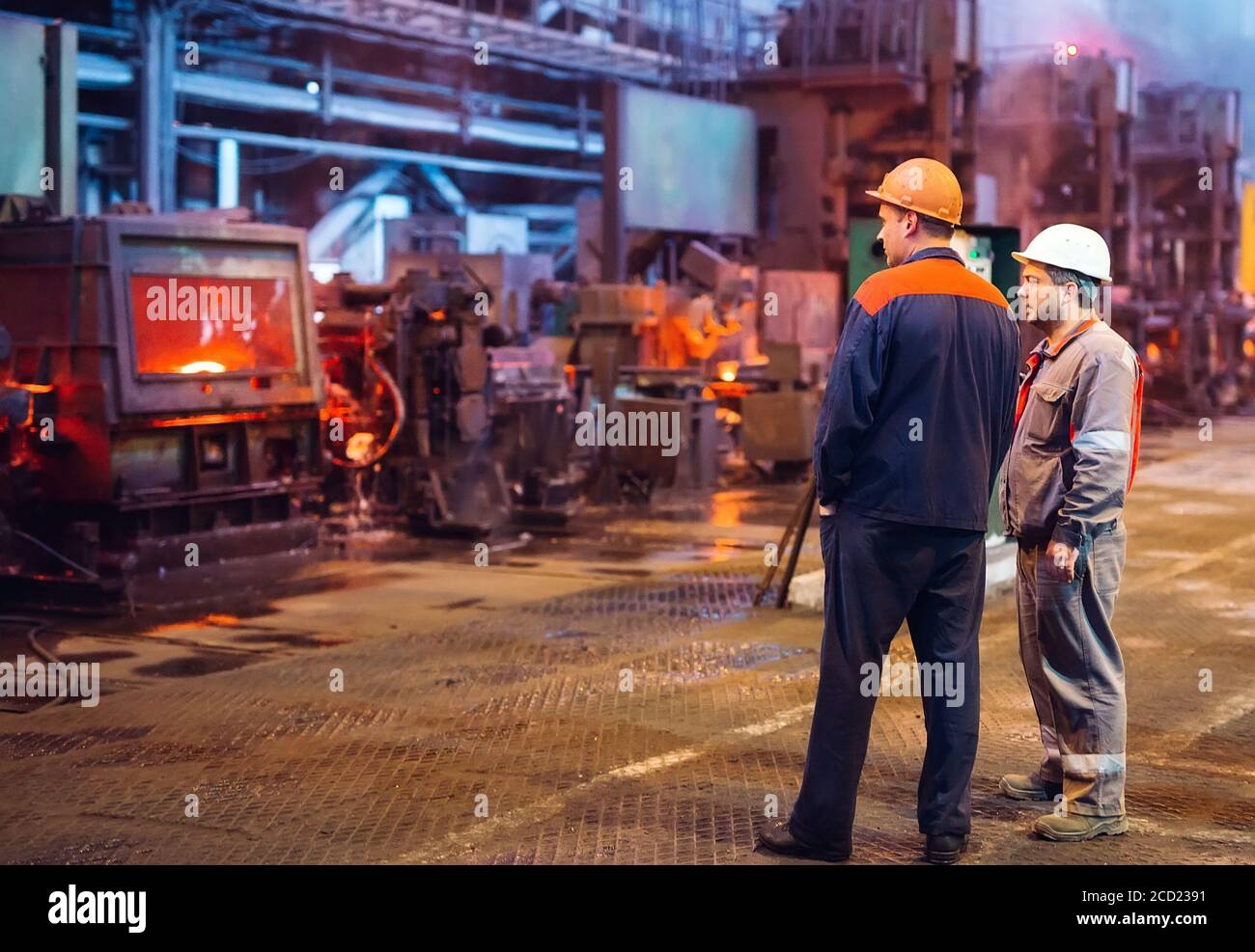Workers in the steel mill. Metallurgical production or plant Stock ...