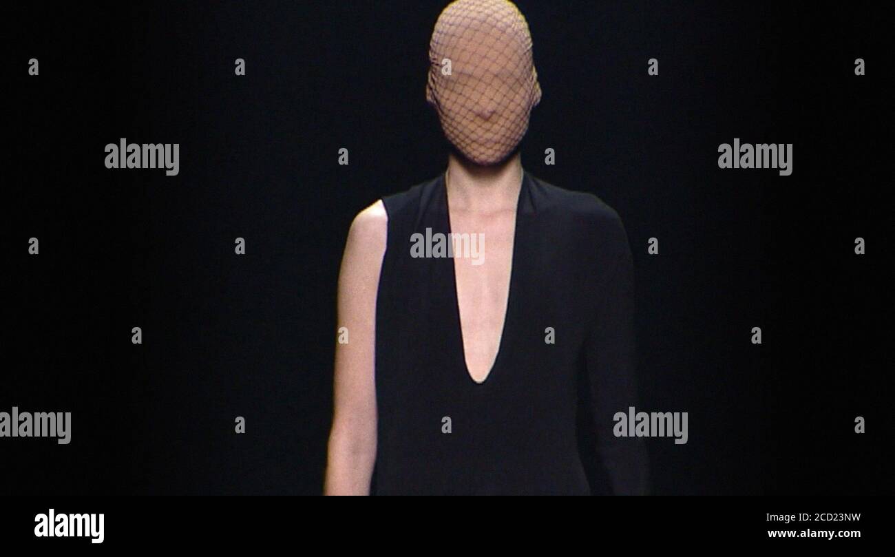 MARTIN MARGIELA: IN HIS OWN WORDS, model walking the runway for Maison ...