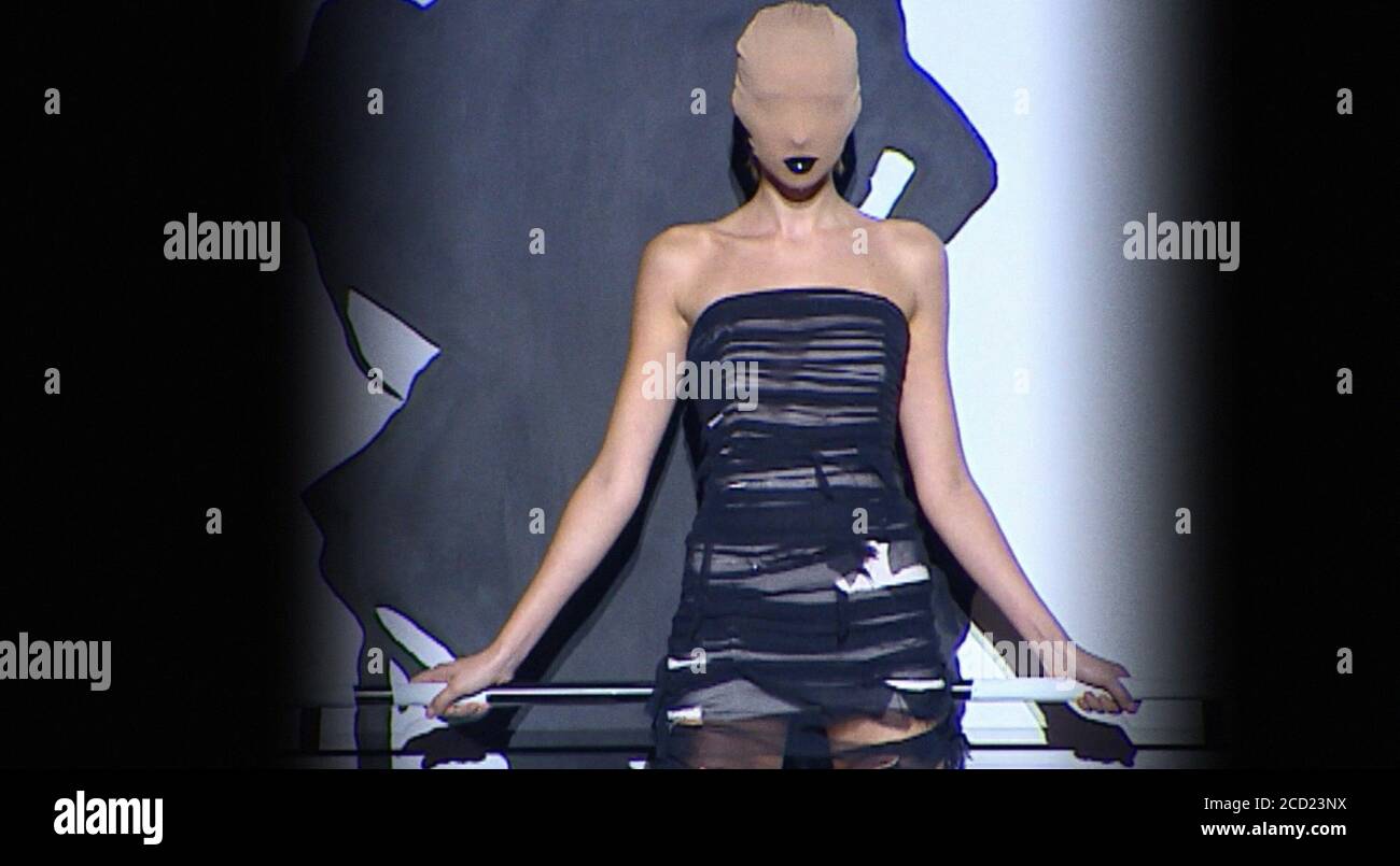 MARTIN MARGIELA: IN HIS OWN WORDS, model walking the runway for Maison ...