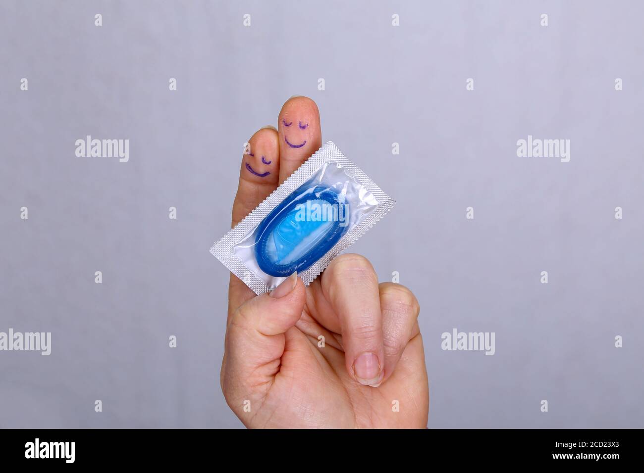 Holding condom hi-res stock photography and images - Alamy