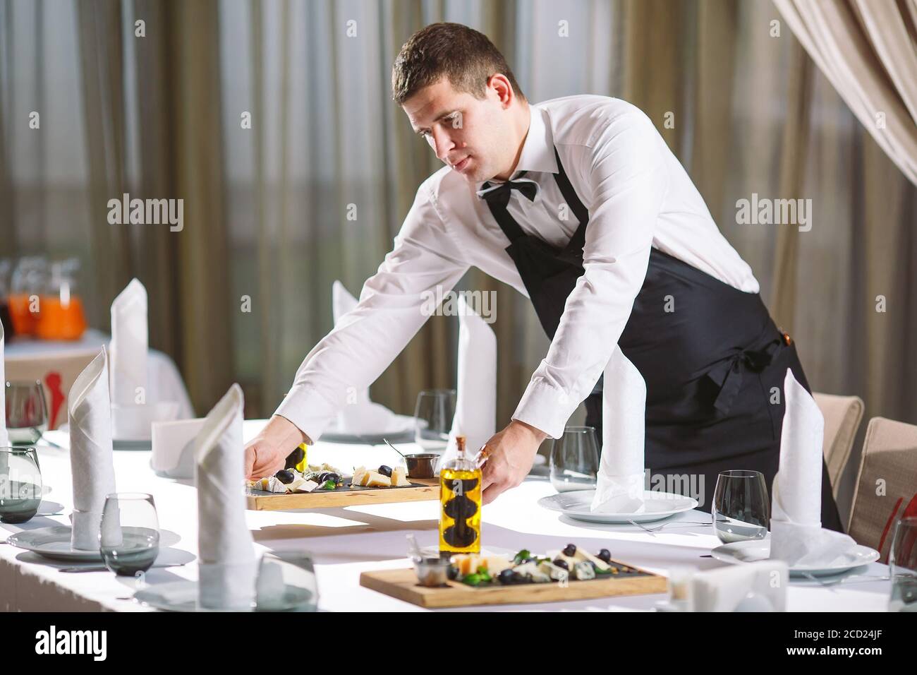 Preparing to receive serve hi-res stock photography and images - Alamy