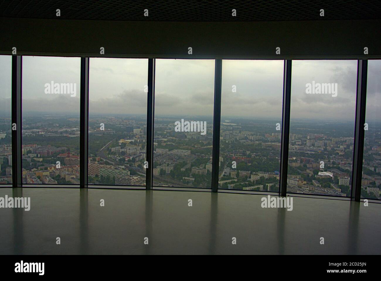A look at the cityscape view of Wroclaw through multiple window panes ...