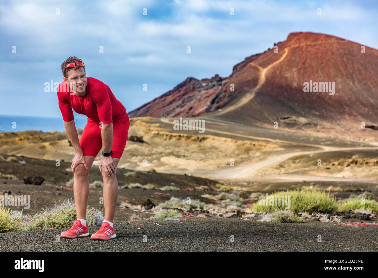 Tired runner on trail run feeling exhausted and dehydrated from the ...