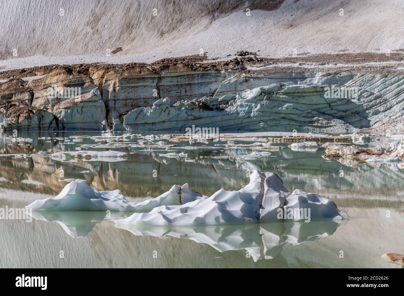 Angel Glacier hangs over a cliff below Mount Edith Cavell in Jasper ...