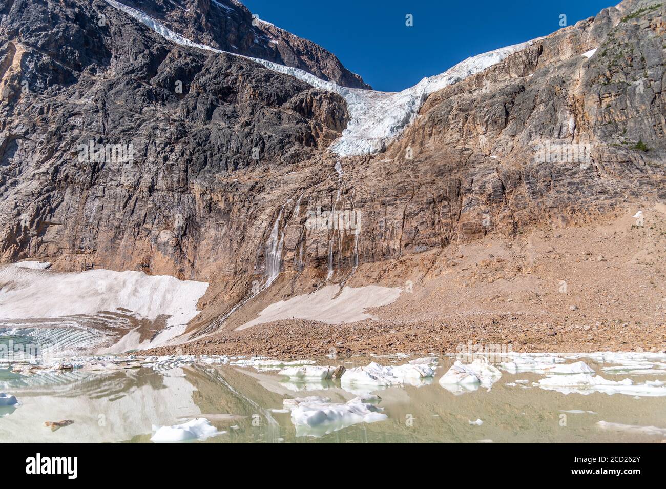 Angel Glacier hangs over a cliff below Mount Edith Cavell in Jasper ...